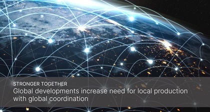 Local production with global coordination